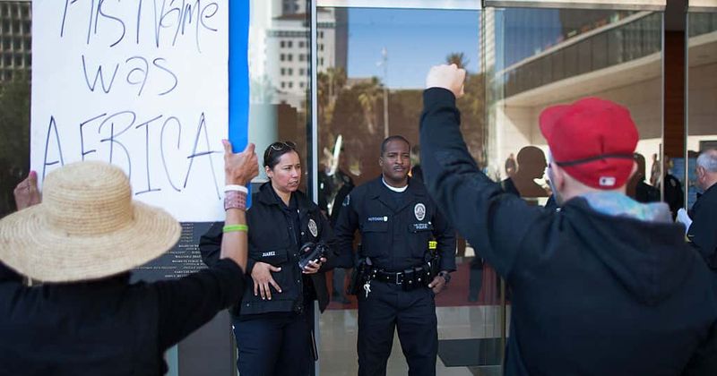 Image Source: Activists Protest Police Shooting Of Homeless Man. LOS ...